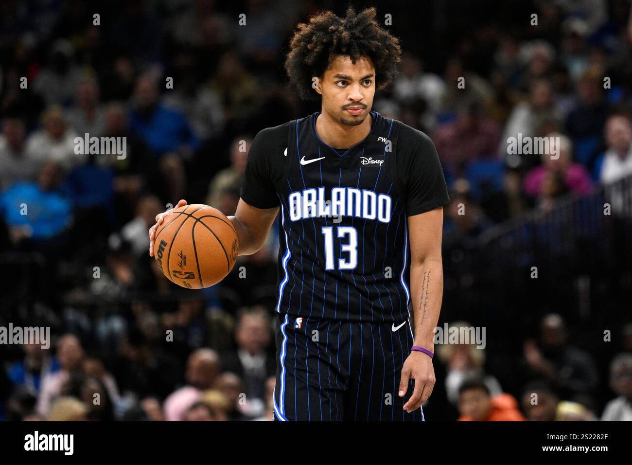 Orlando Magic guard Jett Howard (13) brings the ball up the court ...