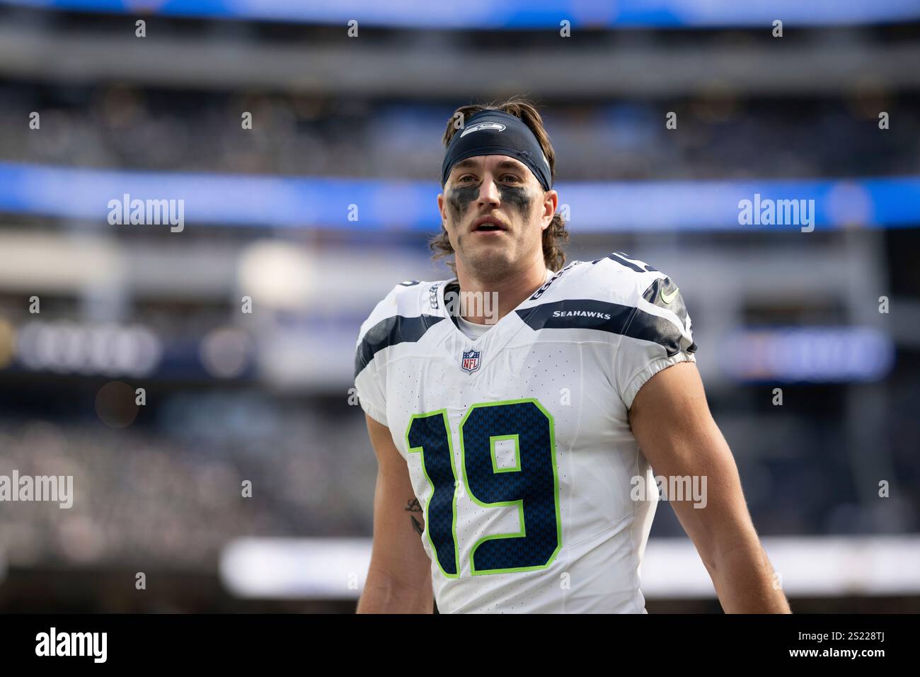 Seattle Seahawks wide receiver Jake Bobo (19) walks back to the locker ...