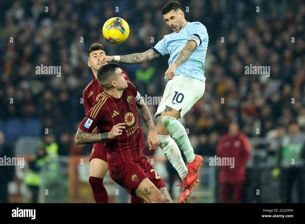 Rome, Italy. 05th Jan, 2025. Mattia Zaccagni of Lazio and Gianluca Mancini of Roma seen in ...
