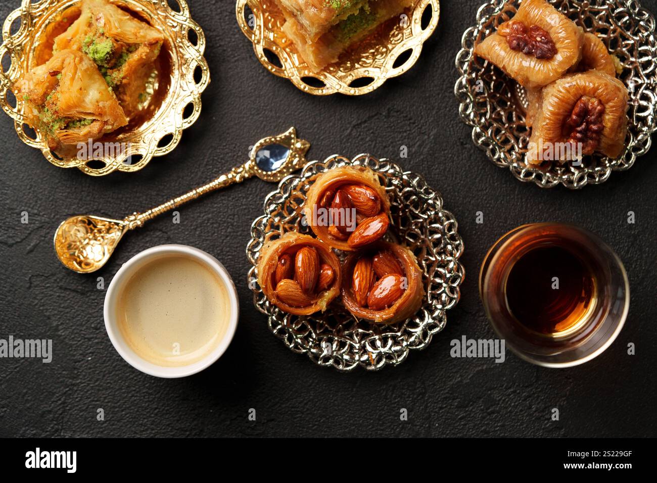 Traditional Middle Eastern sweets served with Arabic coffee on ...