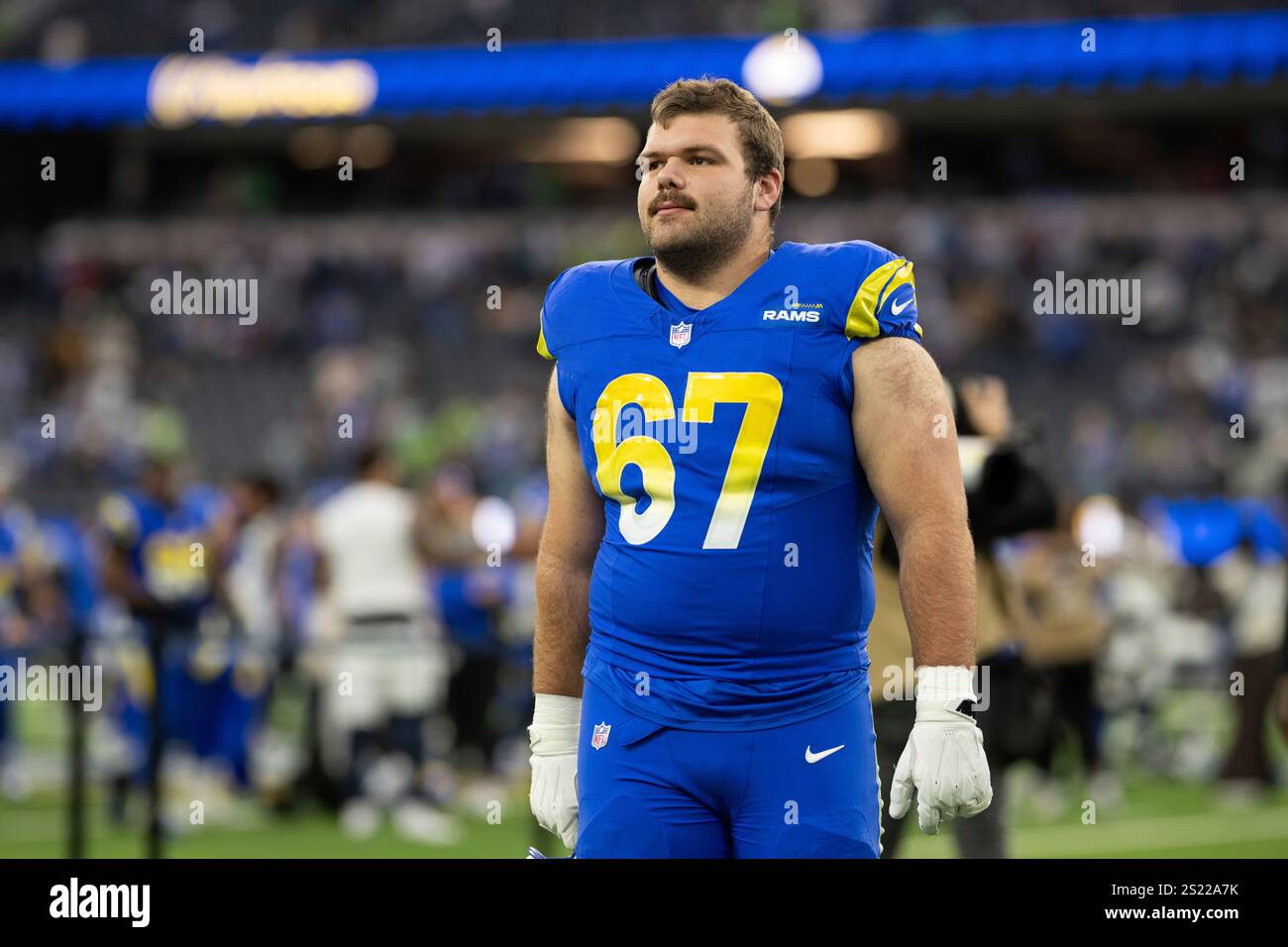 Los Angeles Rams guard Justin Dedich (67) walks back to the locker room ...
