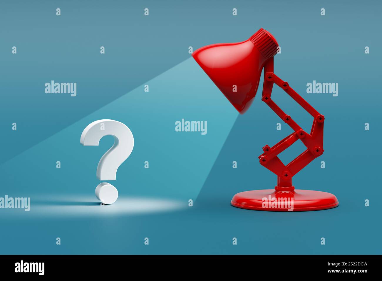 Red desk lamp illuminating a white question mark symbol against a blue ...