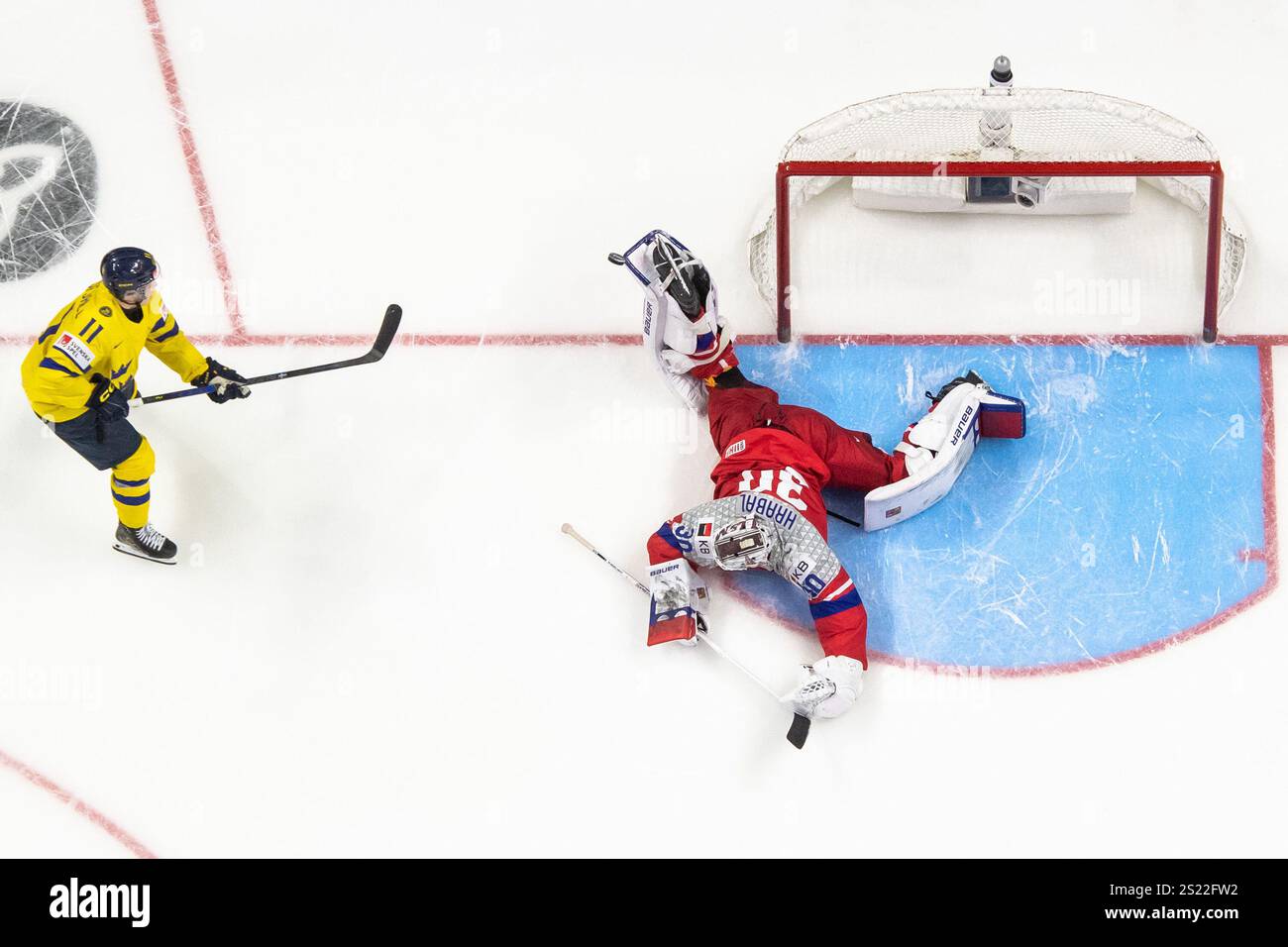 Goaltender Michael Hrabal of, Czech Republic. , . makes a save against ...