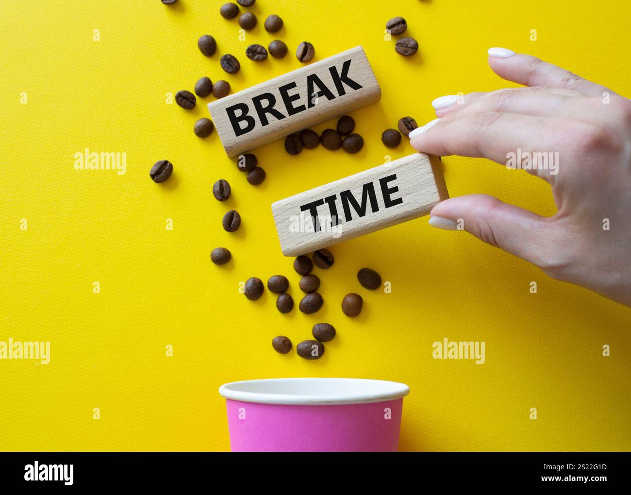 Break Time symbol. Concept word Break Time on wooden blocks. Beautiful yellow background with ...