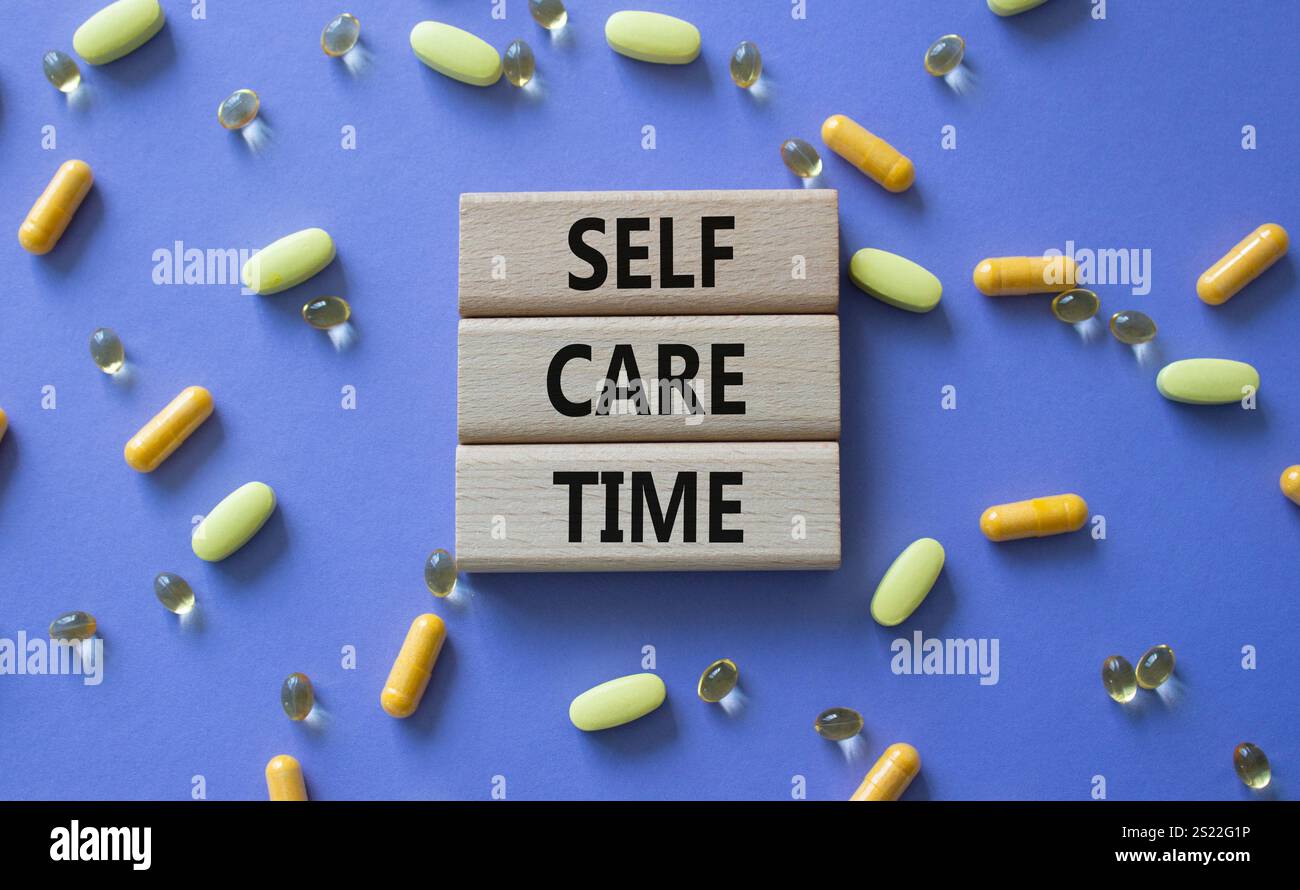 Self-care Time symbol. Concept words Self-care Time on wooden blocks ...