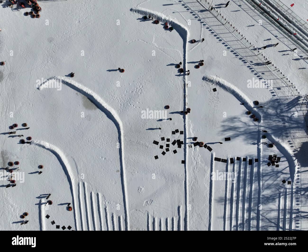 Tourists enjoy winter time at an ice and snow park in Shenyang City ...