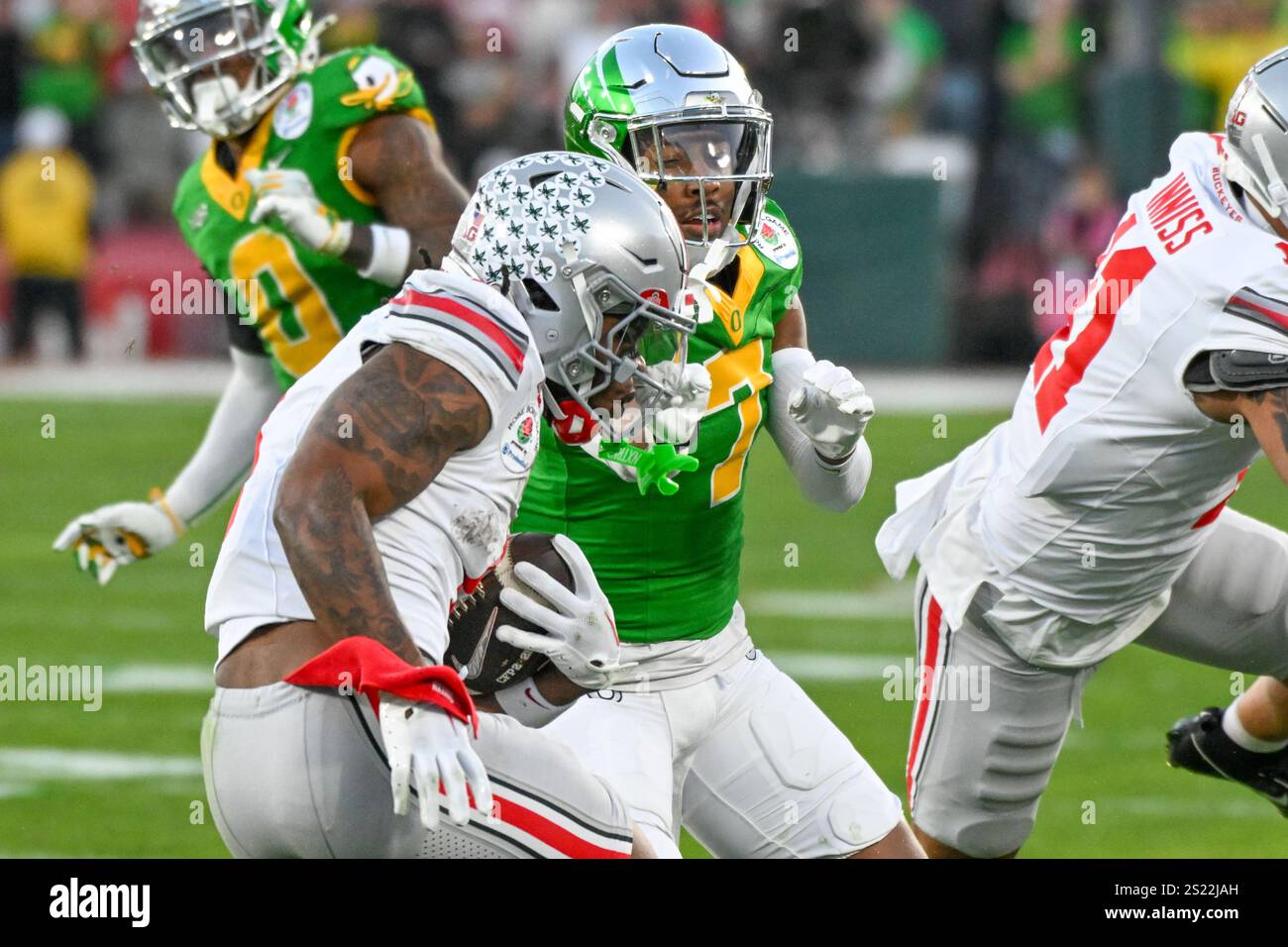 Oregon Ducks defensive back Jabbar Muhammad (7) grabs the face mask of ...