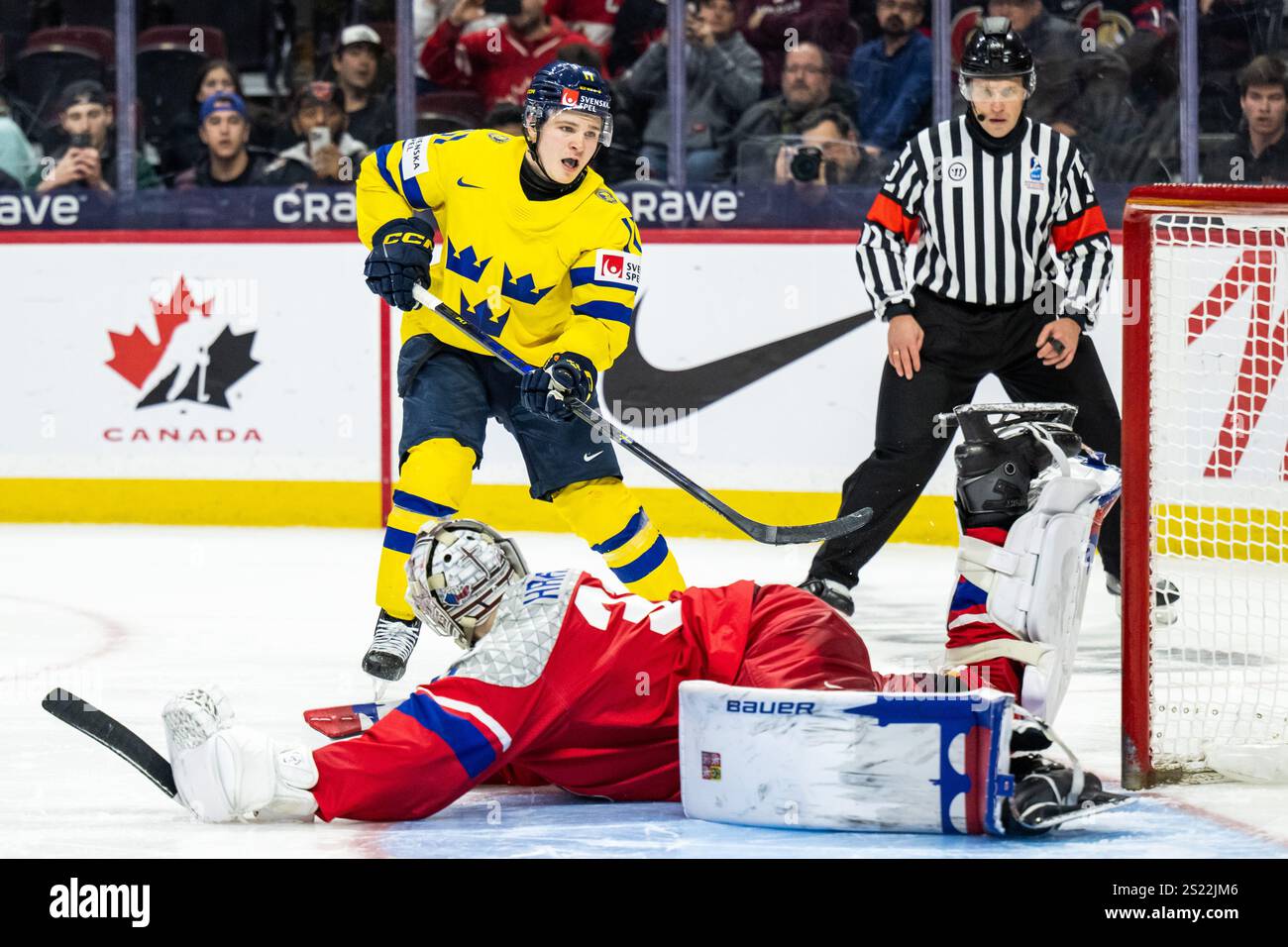 Goaltender Michael Hrabal of, Czech Republic. , . makes a save against ...