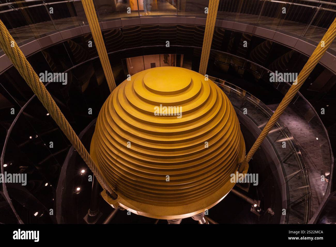 steel pendulum that serves as a tuned mass damper inside the Taipei 101 ...