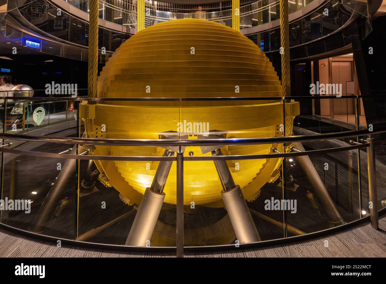 steel pendulum that serves as a tuned mass damper inside the Taipei 101 ...