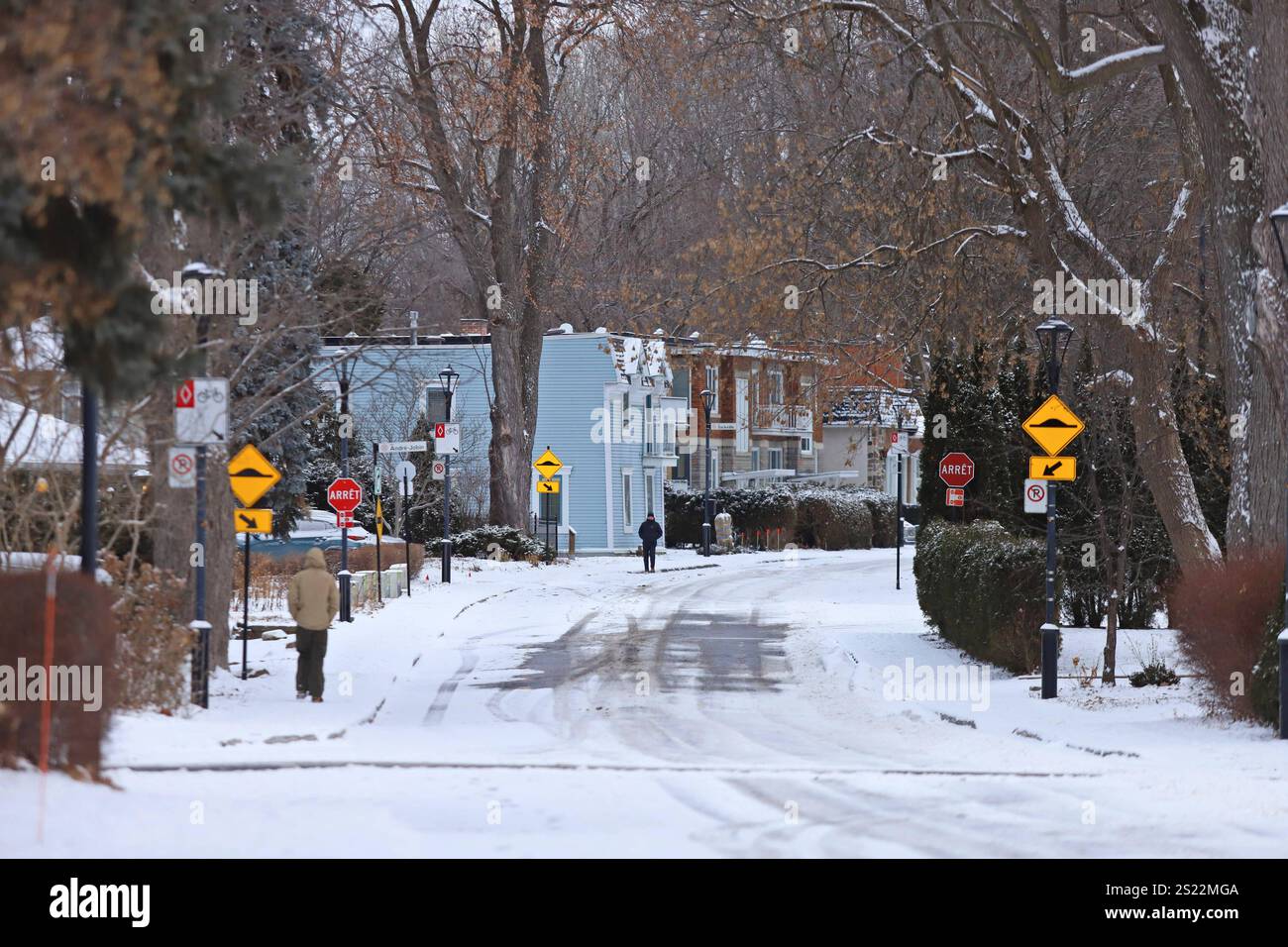 The Cold Spell Hits Across Quebec Persons walks in the middle of a ...