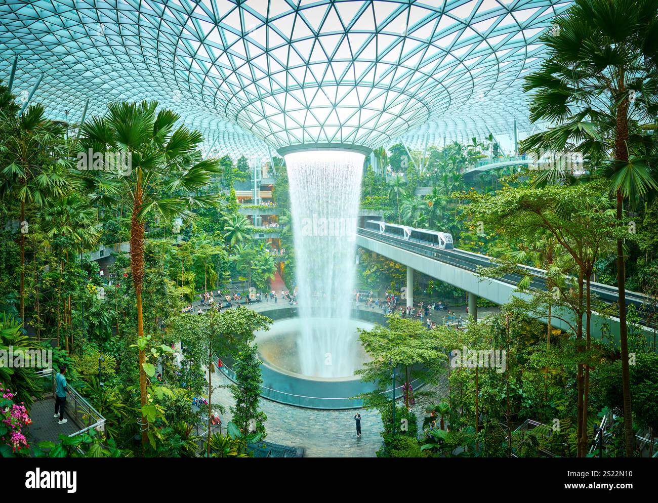 Rain vortex waterfall cascading inside the jewel changi airport ...