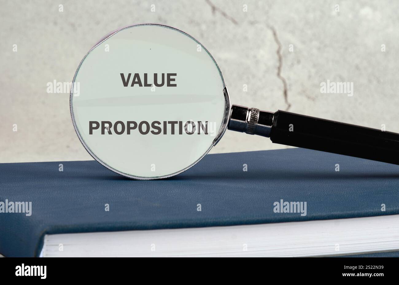 Value added concept. Words VALUE PROPOSITION on the glass of a ...