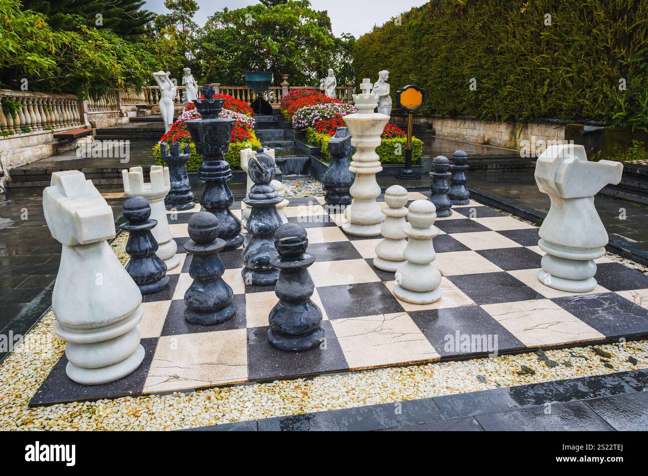 A large chessboard with huge chess pieces on it in the garden at Ba Na ...