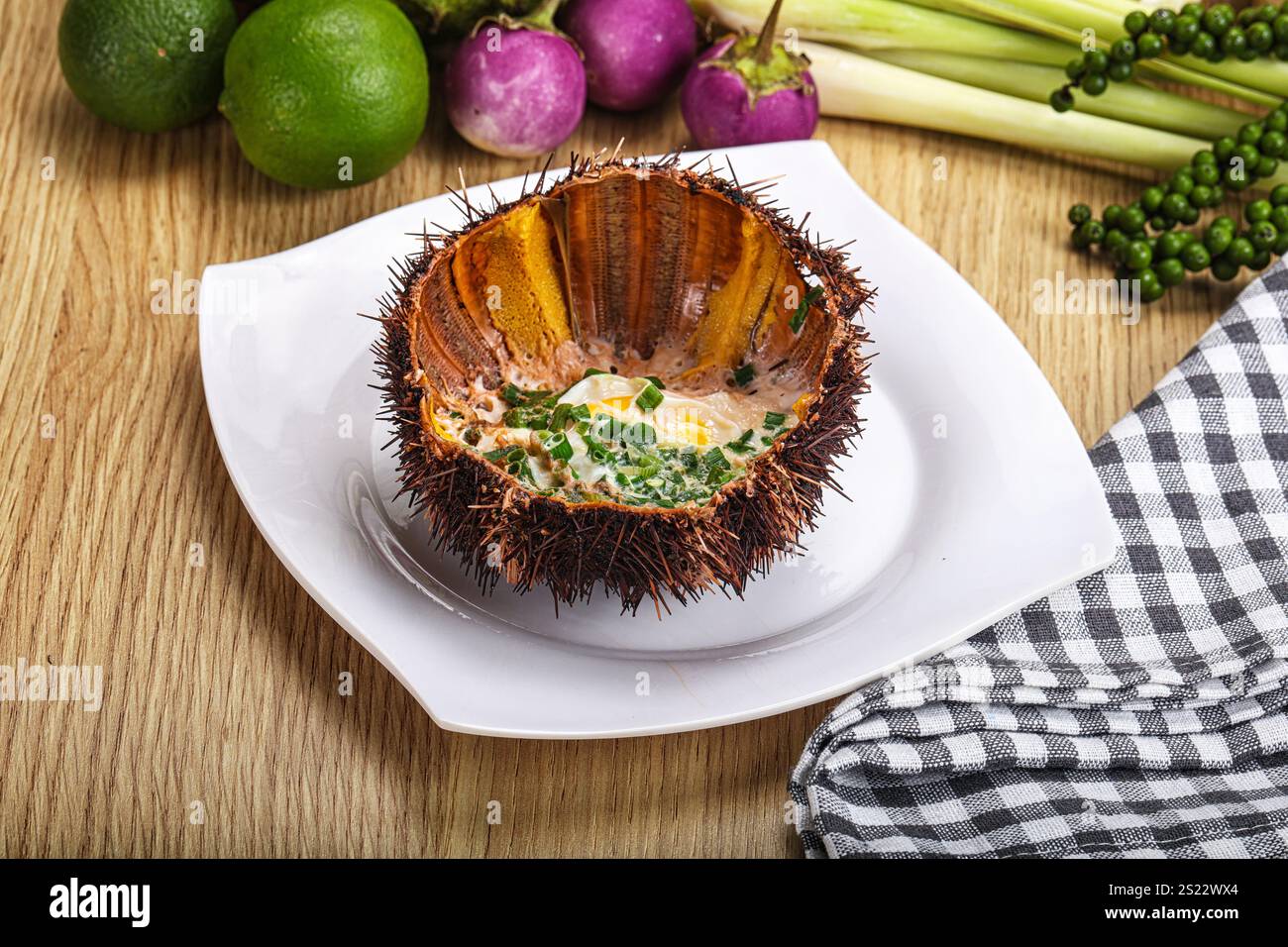 Delicous Grilled Sea Urchin with egg Stock Photo - Alamy