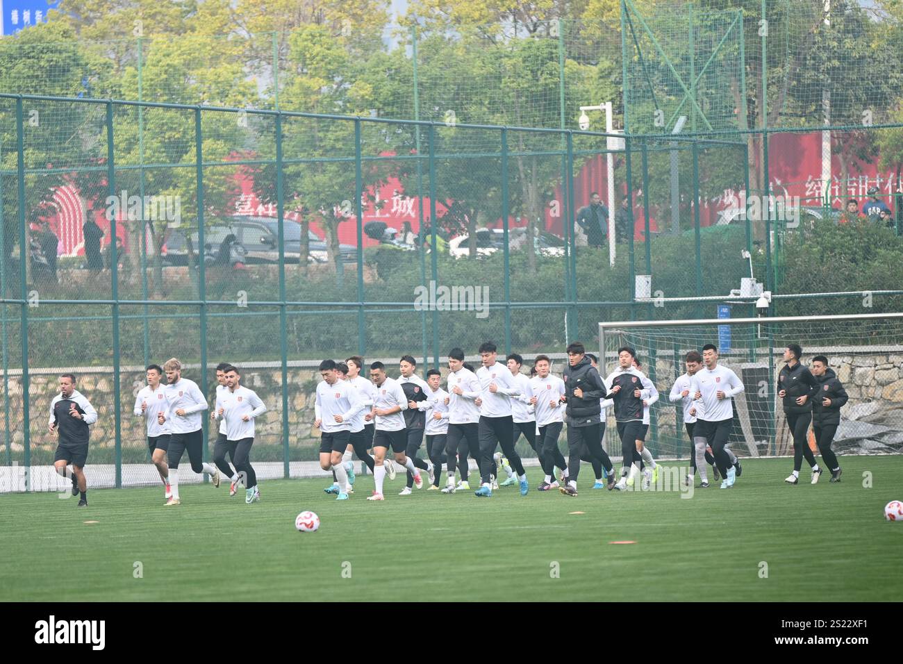 Players of Chengdu Rongcheng Football Club train for the new season in ...