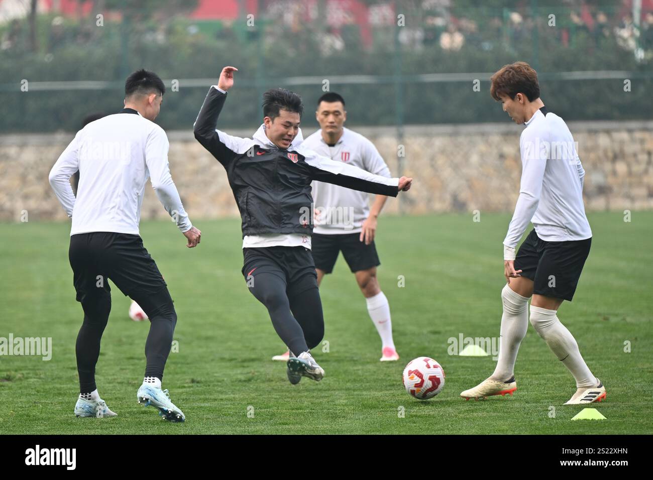 Players of Chengdu Rongcheng Football Club train for the new season in ...
