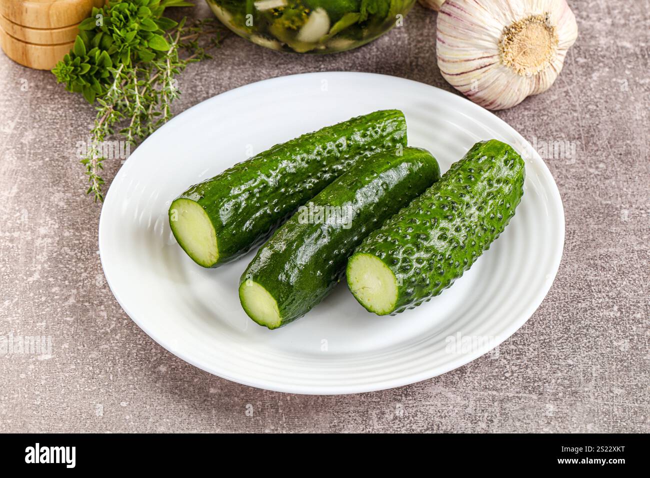 Homemade lighty salted cucumbers with herbs and spices Stock Photo - Alamy
