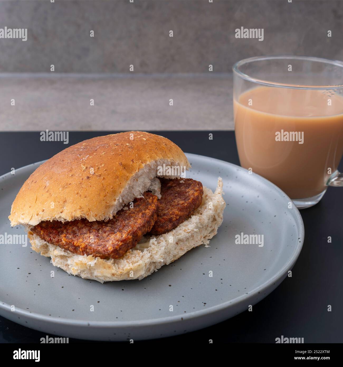 A Scottish Roll and Lorn Slice Sausage with a cup of tea on the side ...