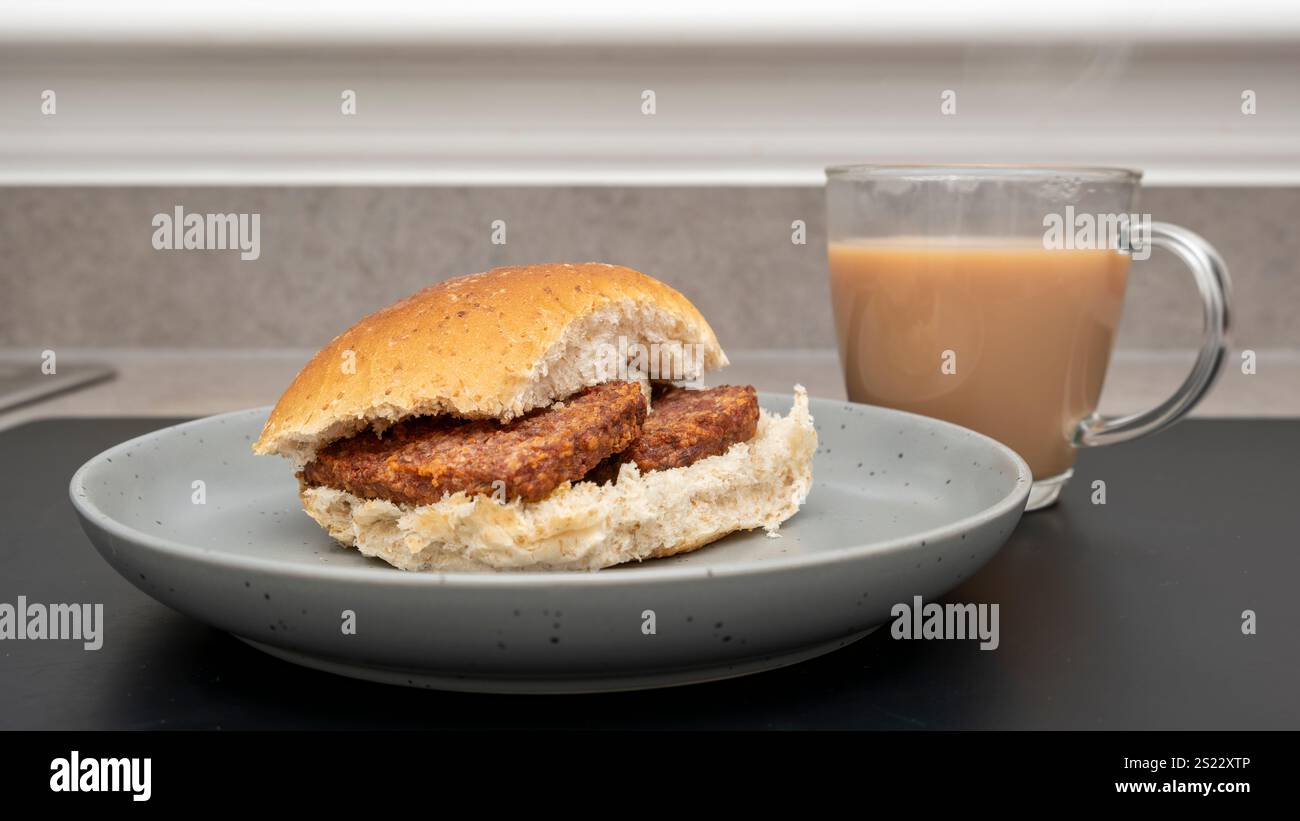 A Scottish Roll and Lorn Slice Sausage with a cup of tea on the side ...
