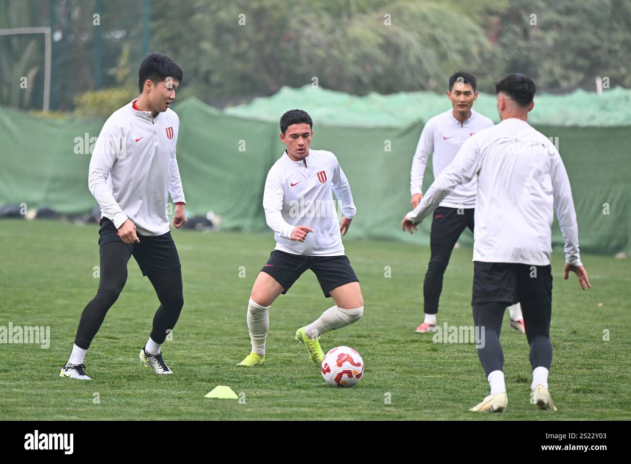 Players of Chengdu Rongcheng Football Club train for the new season in ...