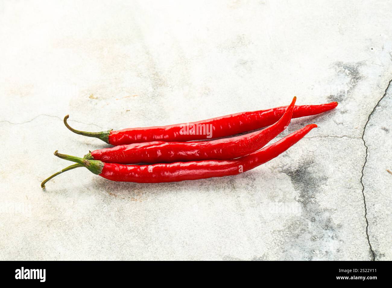 Red hot chilli peppers heap for cooking Stock Photo - Alamy