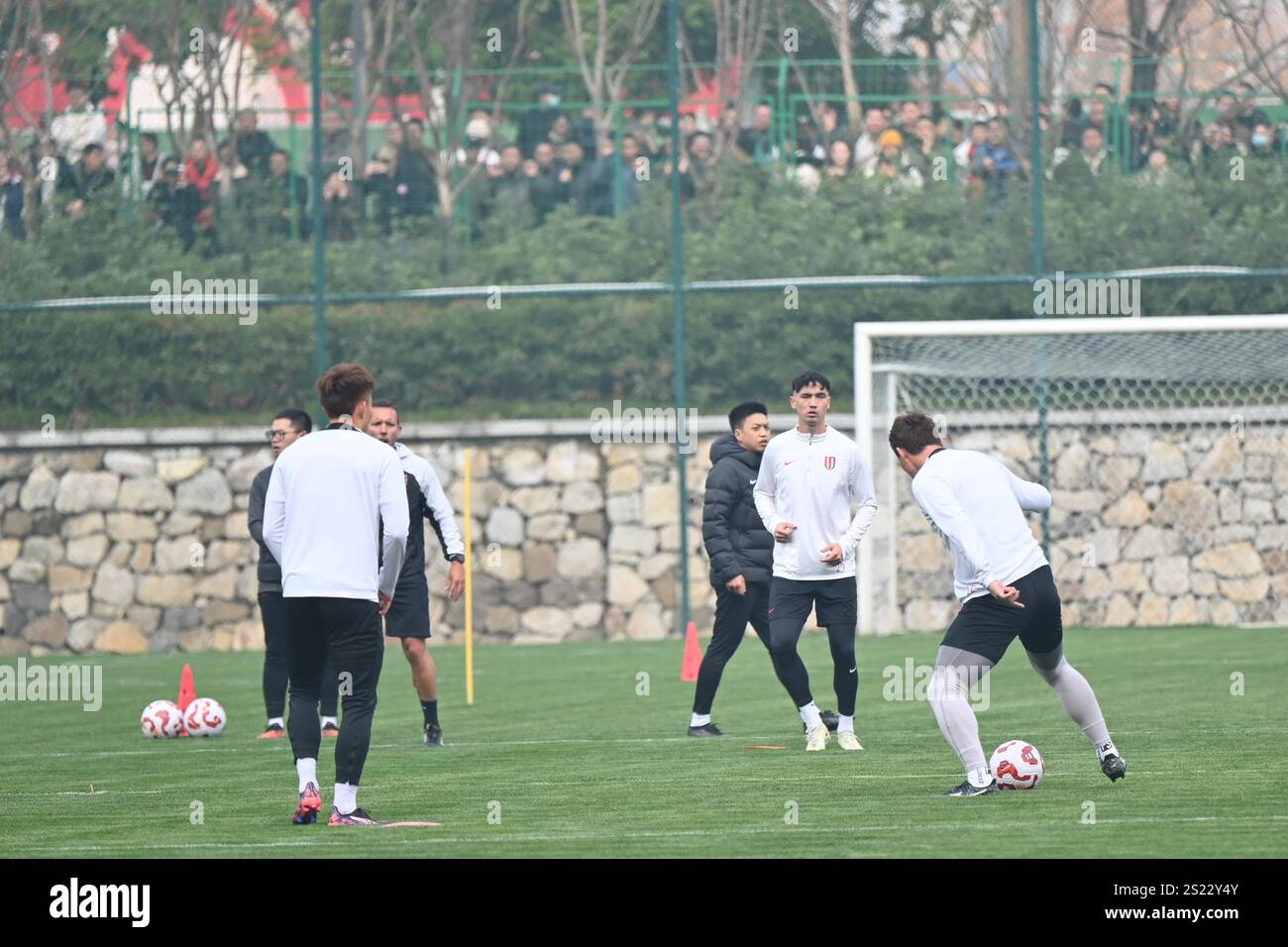 Players of Chengdu Rongcheng Football Club train for the new season in ...