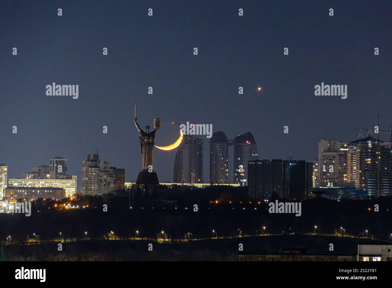 KYIV, UKRAINE - JANUARY 3, 2025 - Venus (R) is close to the Moon in the ...