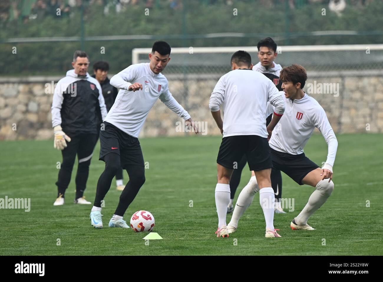 Players of Chengdu Rongcheng Football Club train for the new season in ...