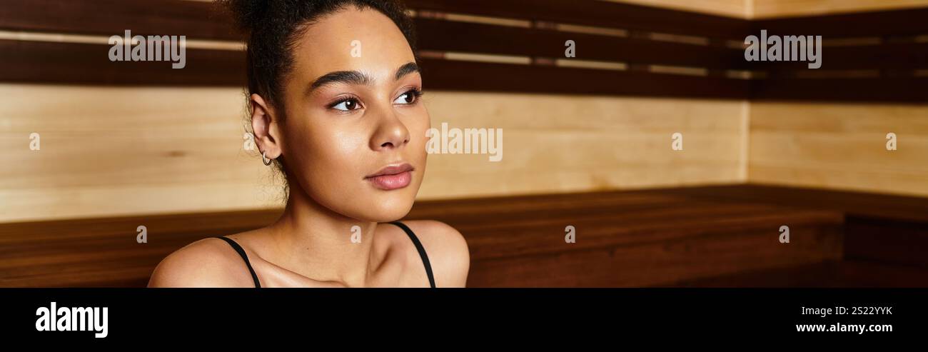 Relaxation takes center stage as a young african american woman enjoys ...