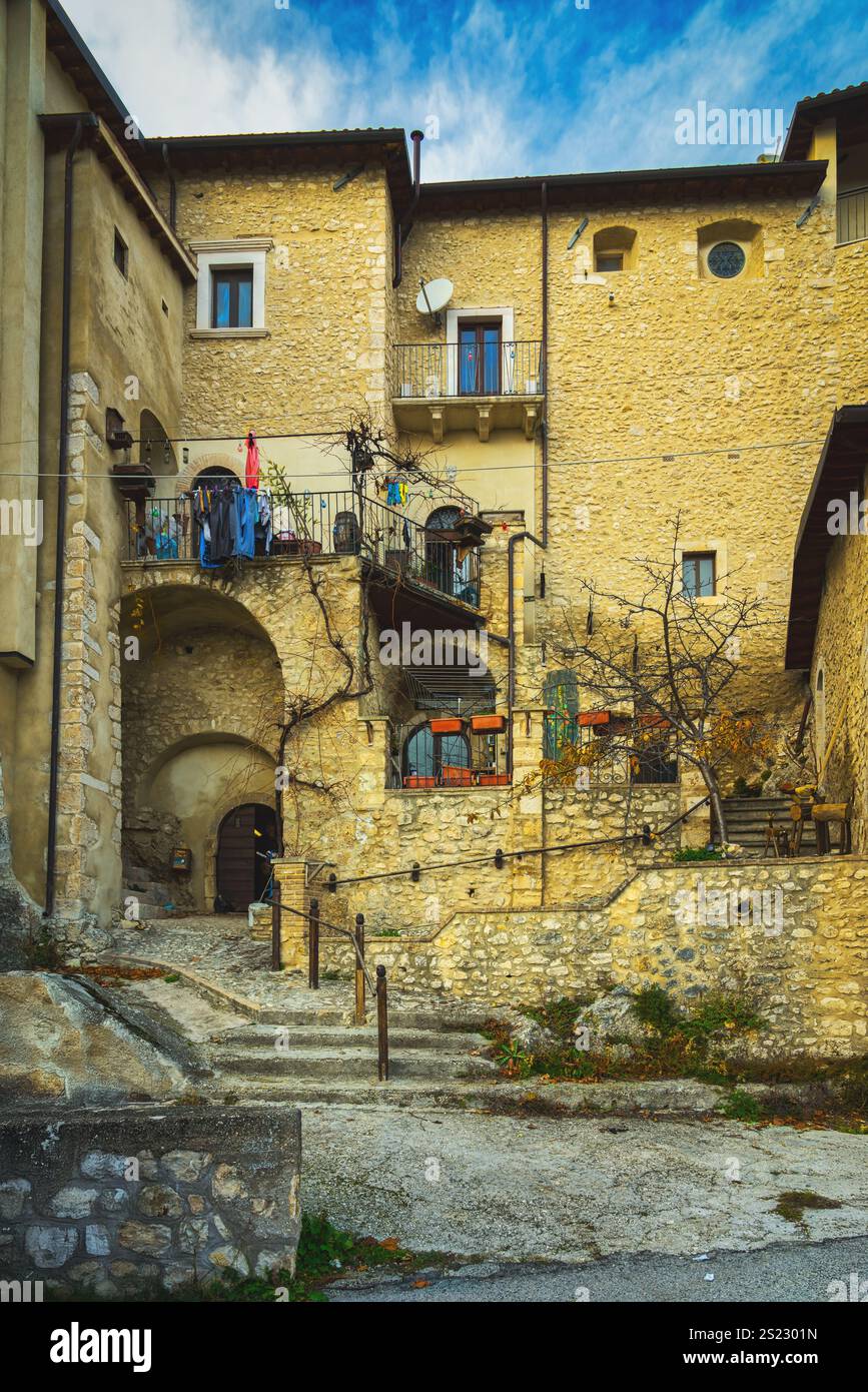 Old houses with moss growing on the outside staircase medieval village ...