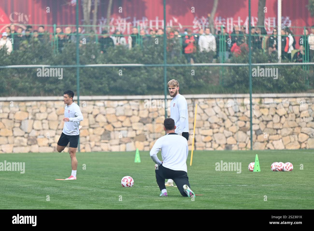 Players of Chengdu Rongcheng Football Club train for the new season in ...