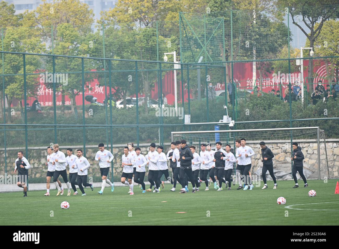 Players of Chengdu Rongcheng Football Club train for the new season in ...