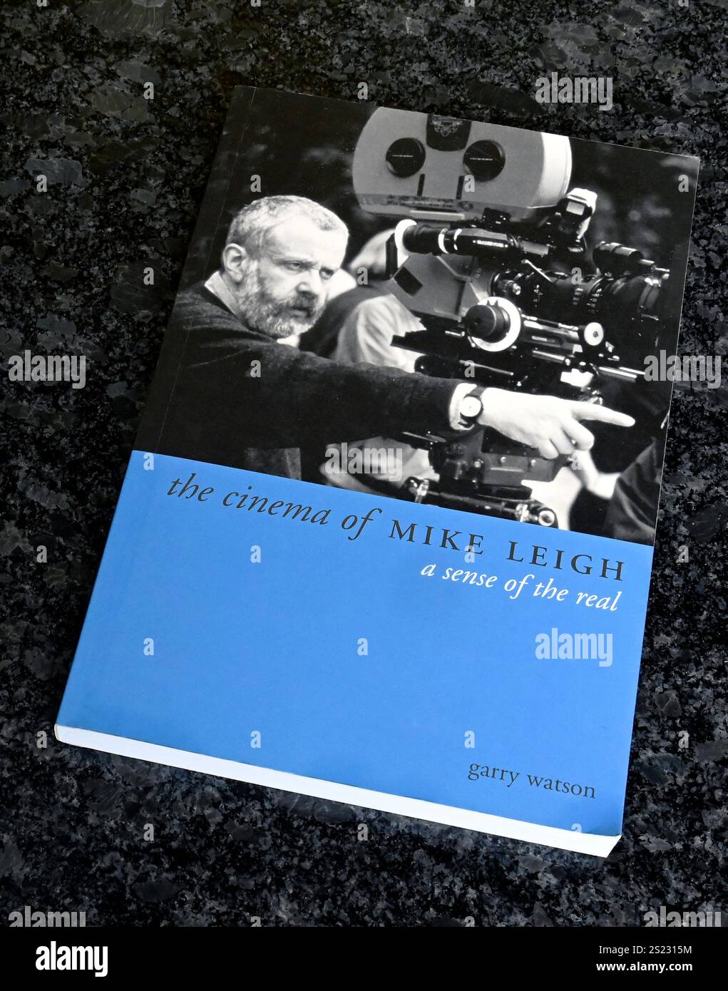 Book cover "The cinema of Mike Leigh a sense of the real" by Garry ...