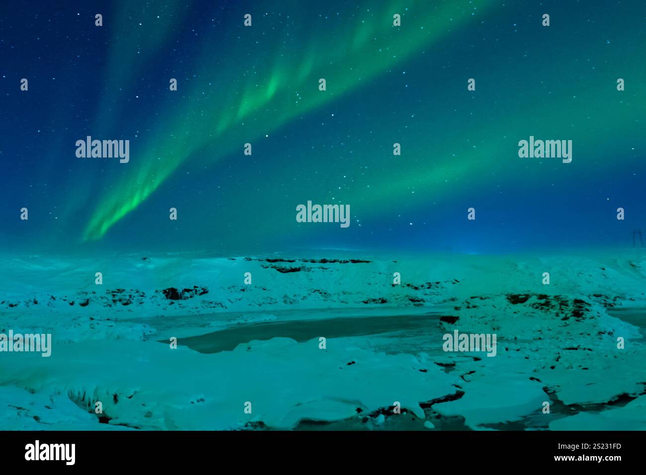 The Northern Lights Stream Over The Icelandic Night Sky Stock Photo - Alamy