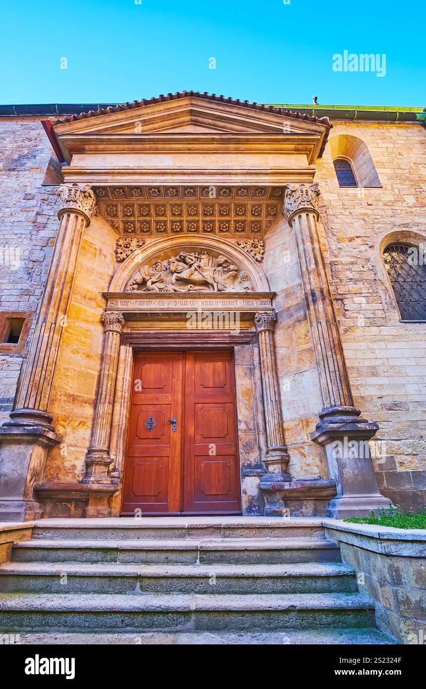 The stone Romanesque side gate of the medieval St George Basilica ...