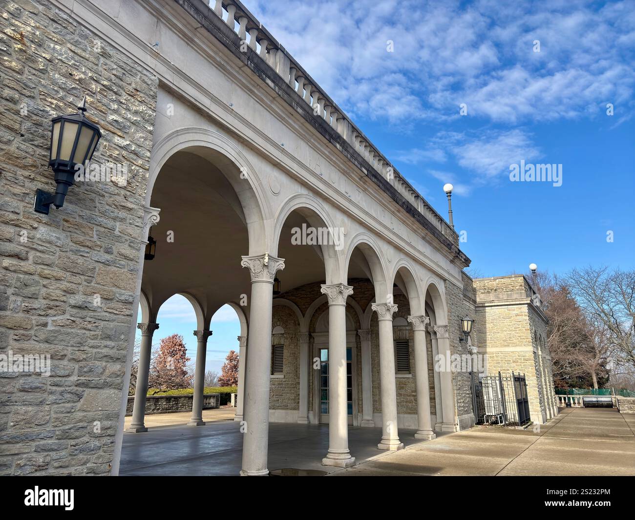 Stone building with elegant arches and decorative columns Stock Photo ...