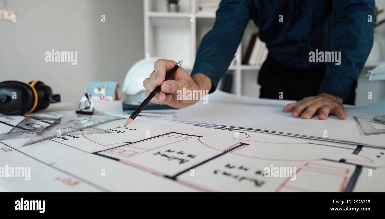Architectural Planning and Design: Architect Working on House Blueprint ...