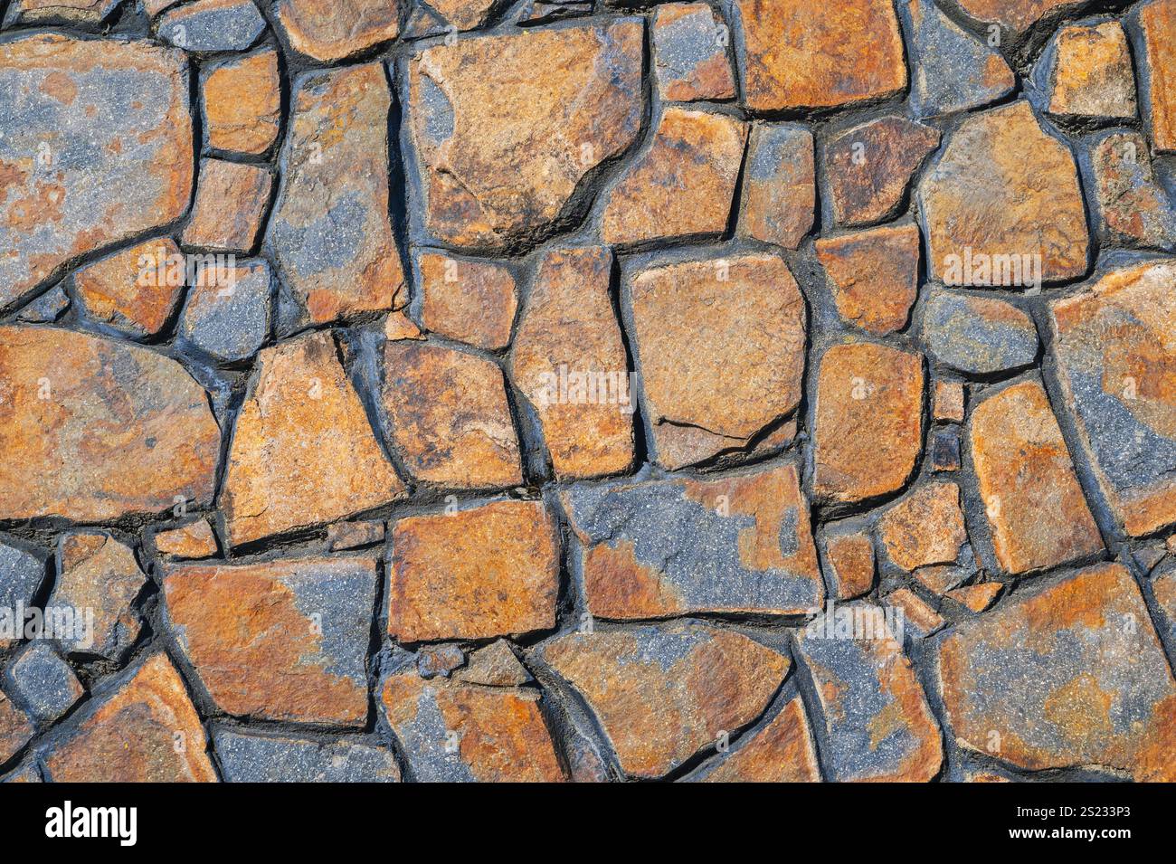 The texture of the walls is made of brown-gray stone, the background of ...