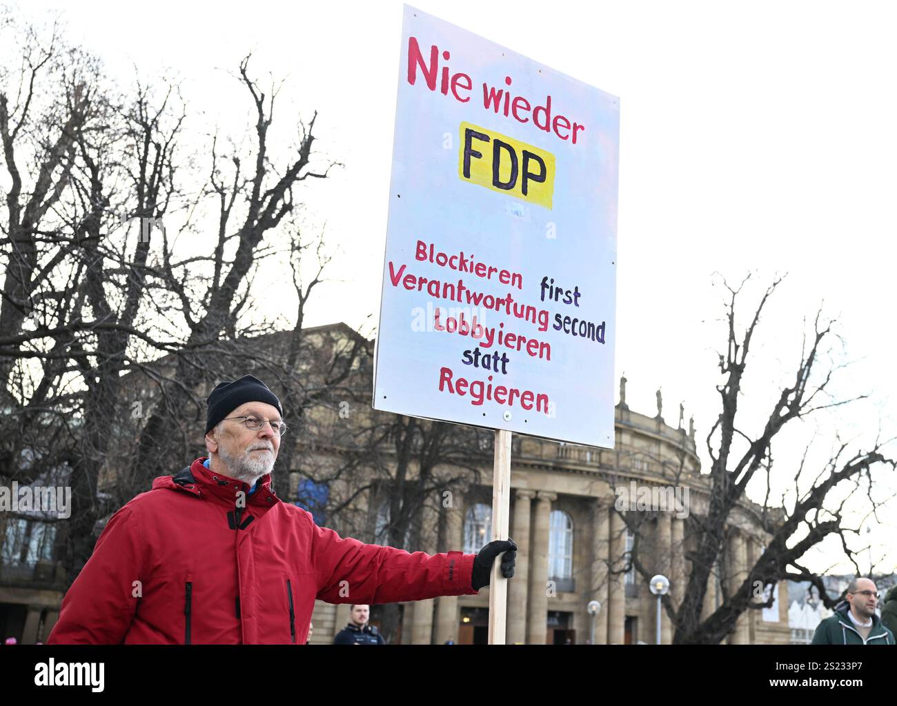Stuttgart, Germany. 06th Jan, 2025. A demonstrator with a banner ...