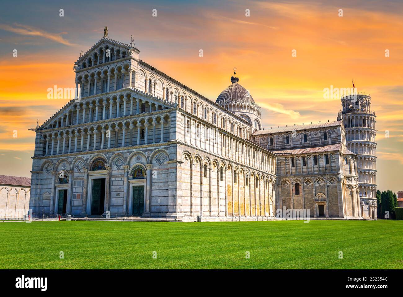 Beautiful sunset sky over Leaning Tower and cathedral in Pisa, Italy ...
