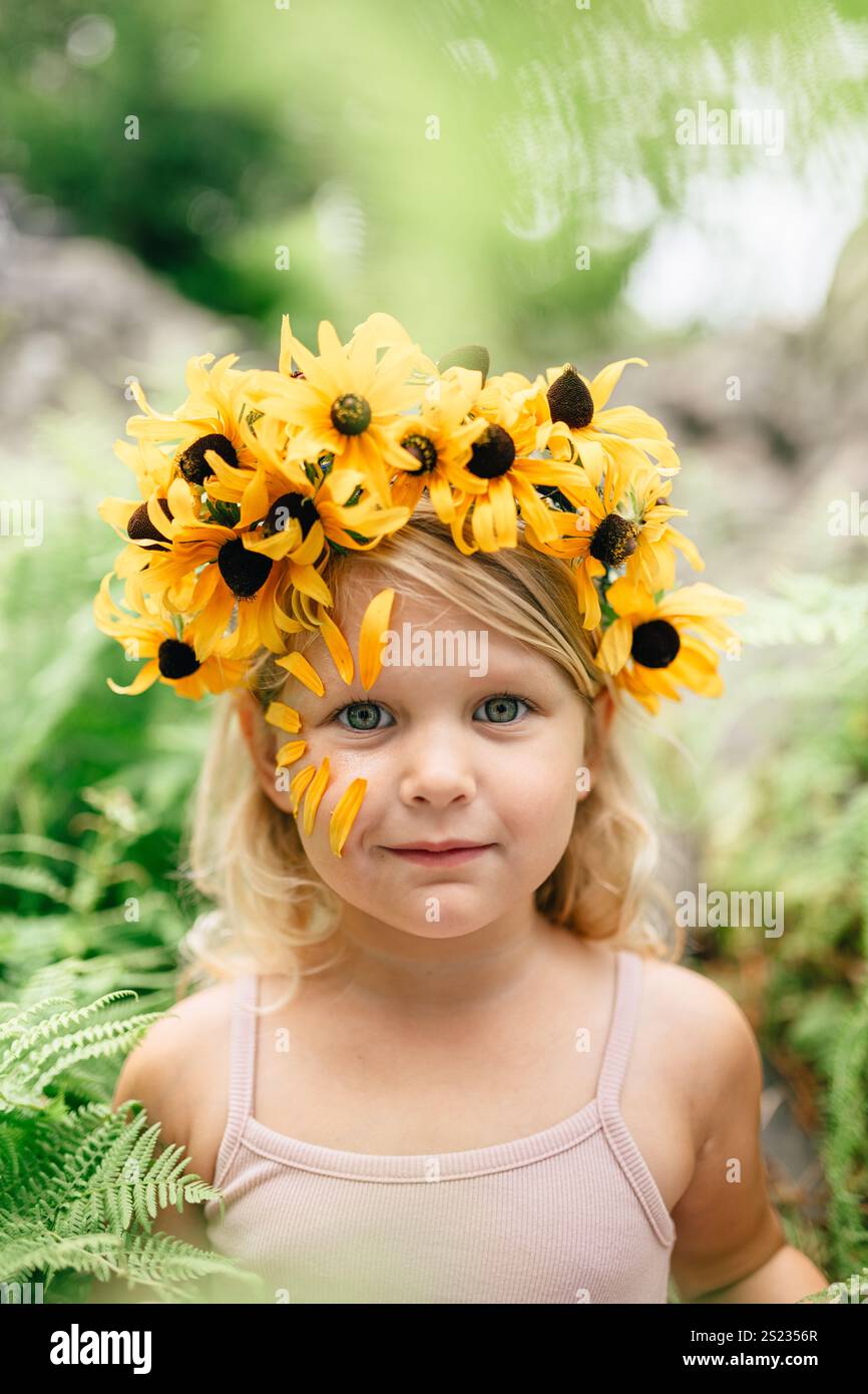 Young girl wearing black eyed Susan flower crown Stock Photo - Alamy