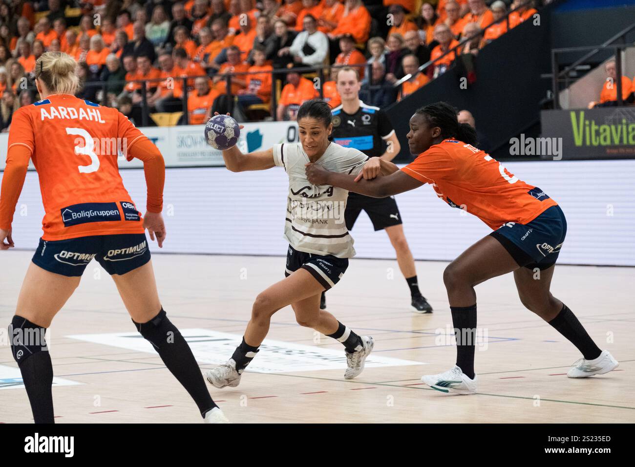 Odense, Denmark. 05th Jan, 2025. Sofia Deen (15) of Aarhus Handball and Lysa Tchaptchet Defo (20 ...