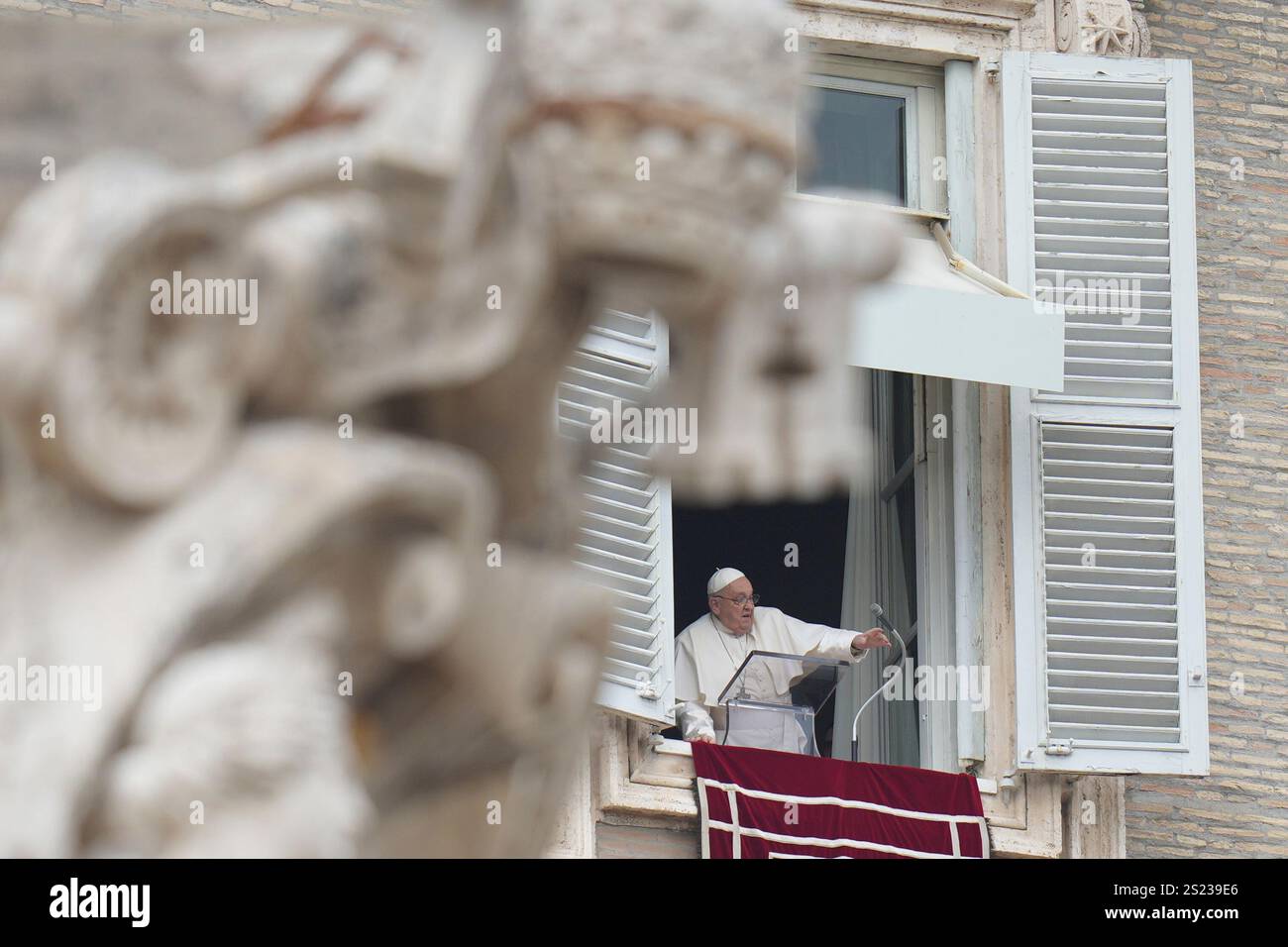 Pope Francis waves during the Angelus noon prayer on the occasion of ...