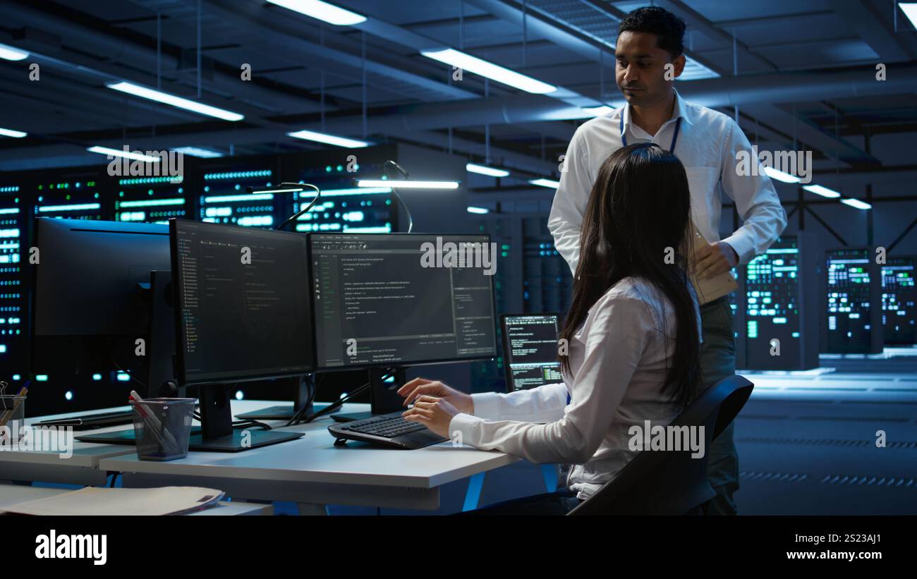 Management Executive In Data Center Ensuring System Can Handle Networking Tasks Coworkers Doing