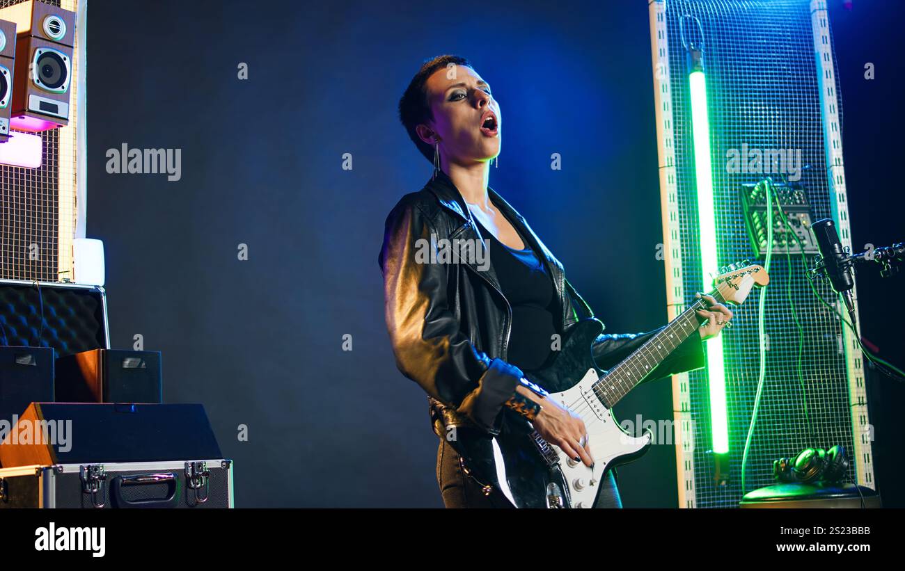 Iconic grunge rocker chewing gum and making bubbles during live ...