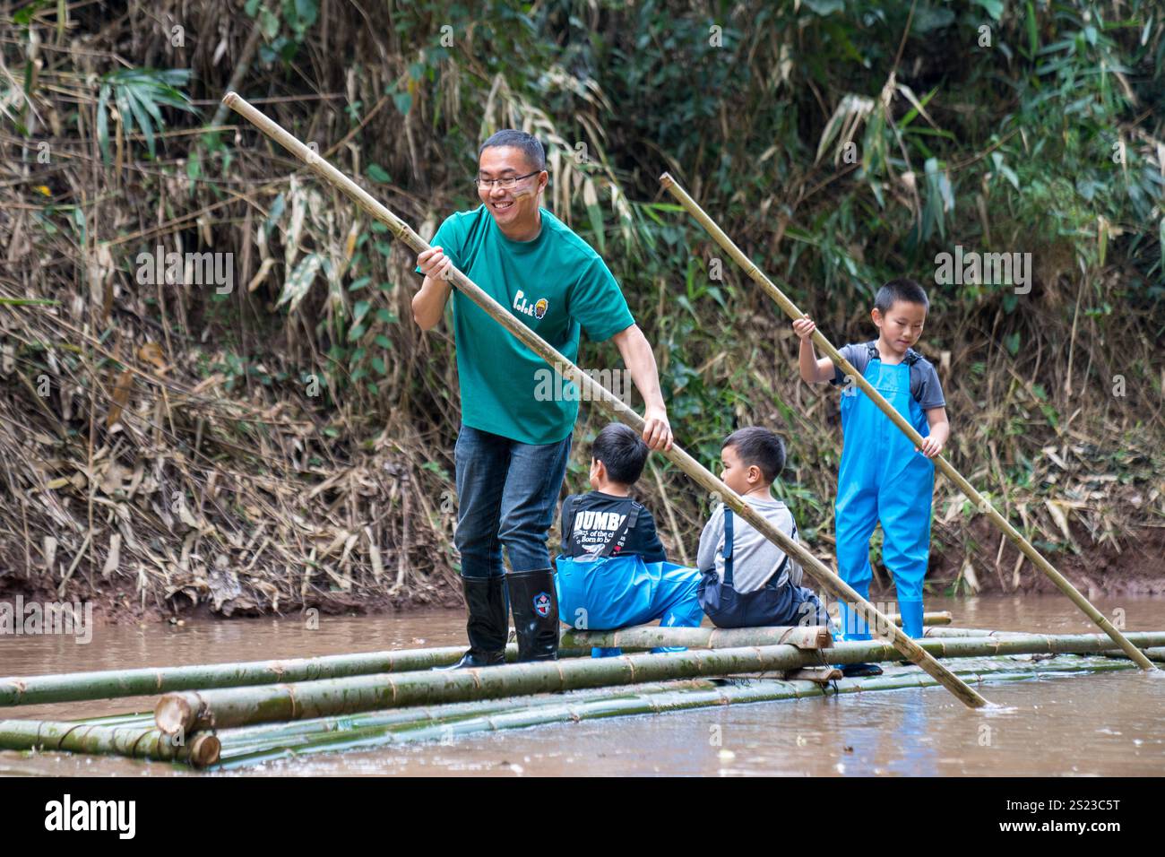 Kunming, China's Yunnan Province. 5th Jan, 2025. Tourists paddle a ...