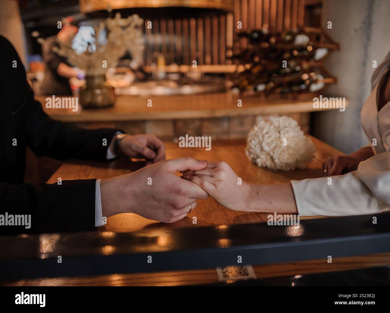Intimate Moment Between Two People at a Restaurant Table Stock Photo ...