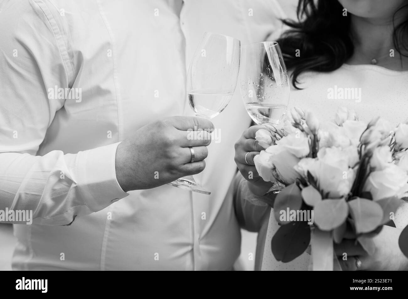 Romantic Wedding Toast Featuring Bride and Groom Holding Champagne ...