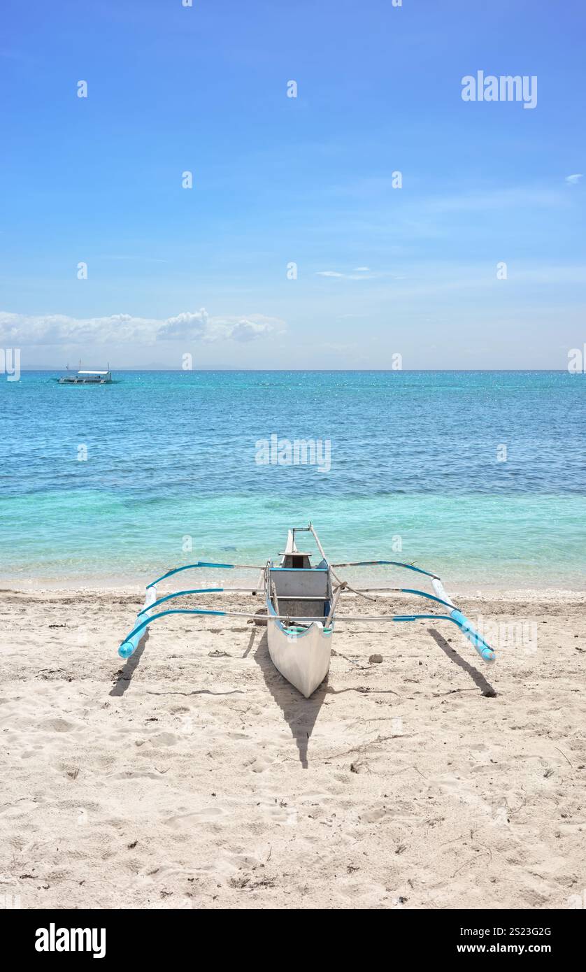 Bangka boat on the beach of Malapascua Island, Philippines Stock Photo ...
